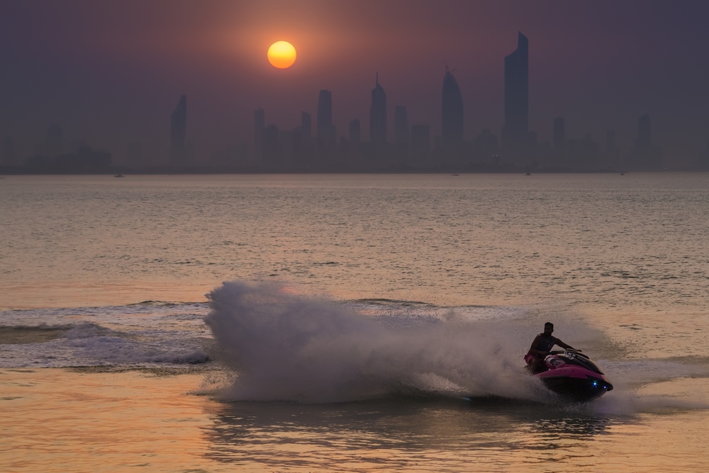 Jet skiing at sunset