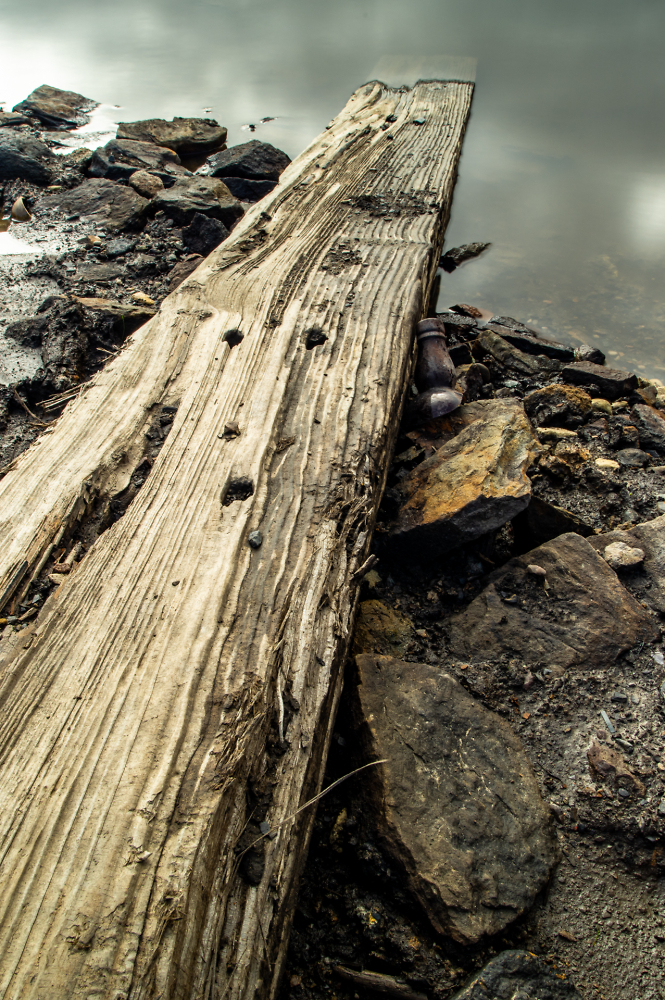 Uncovered by recede....