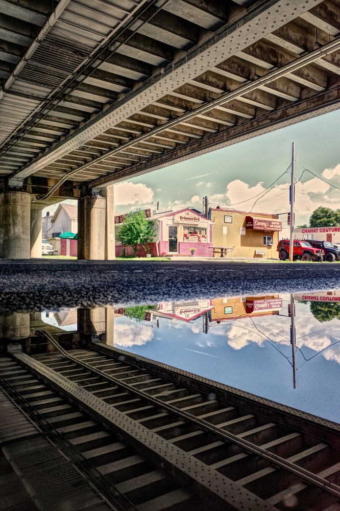 Reflection underneath a train bridge by Jmac8866 - Pentax User